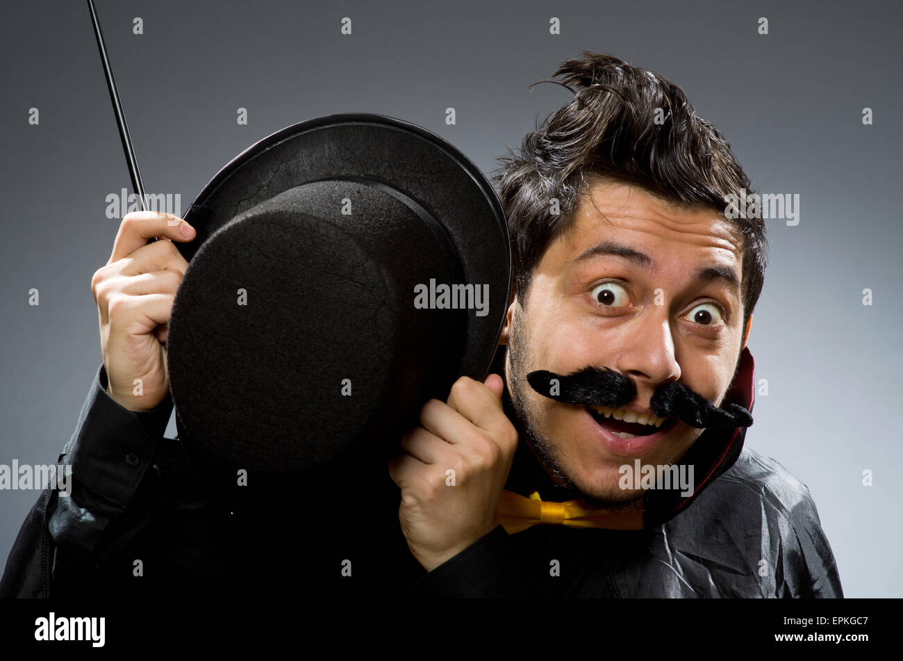 Funny magician man with wand and hat Stock Photo - Alamy