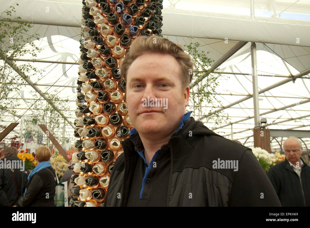 London UK. 19th May 2015. Artist Paul Cummins with his 8metre tall ...