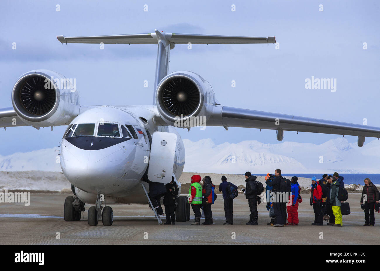 Spitsbergen, Norway. 10th Apr, 2015. Passengers enter a Russian airplane Type Antonov AN-74 TK ...