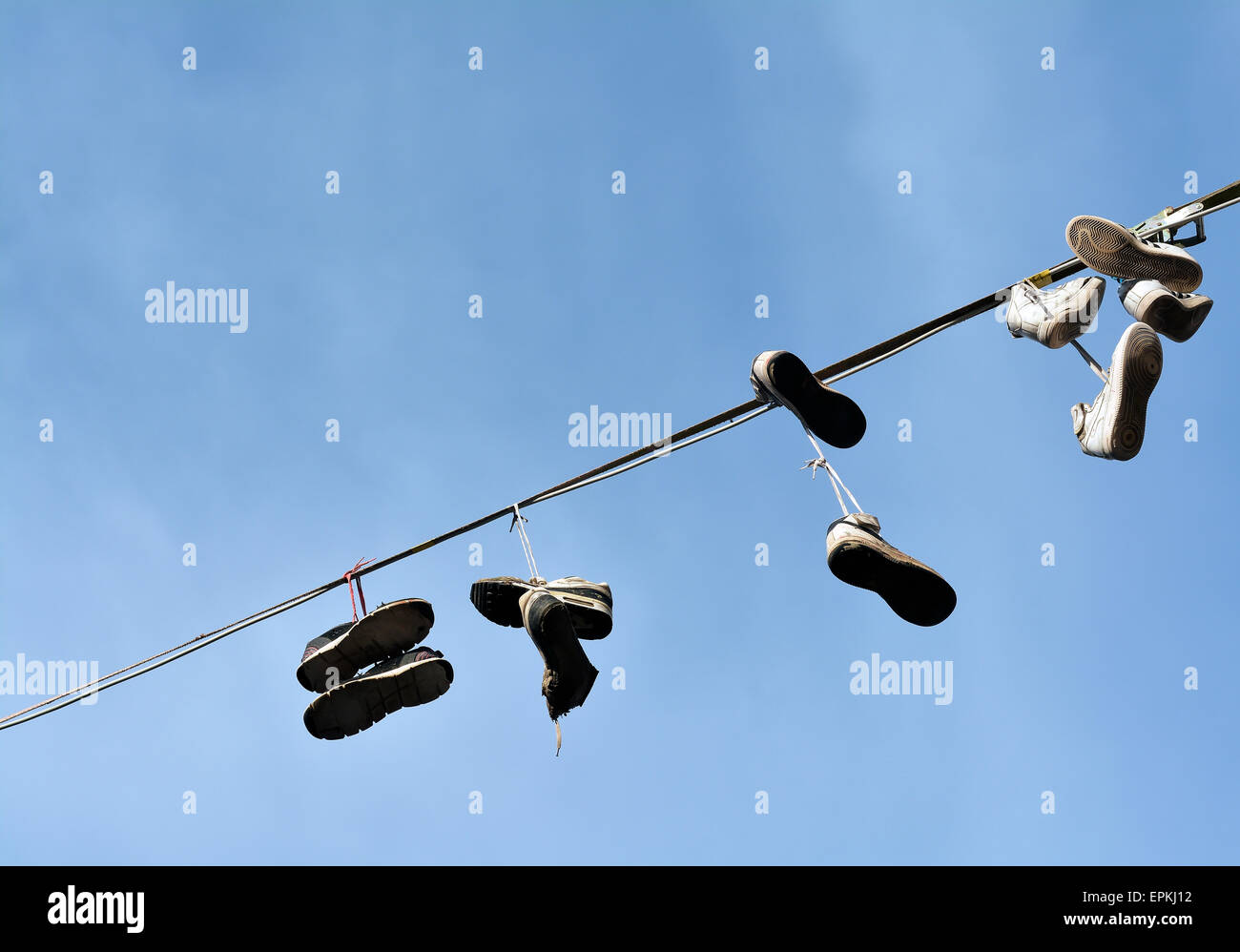 Shoes tied together hi-res stock photography and images - Alamy