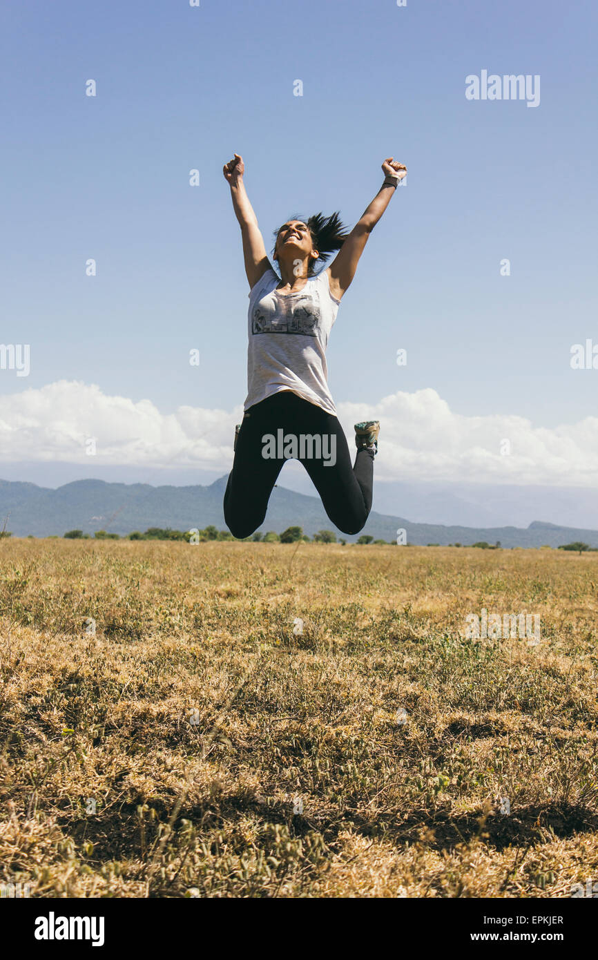 Ethiopia, Young woman jumping for joy Stock Photo - Alamy