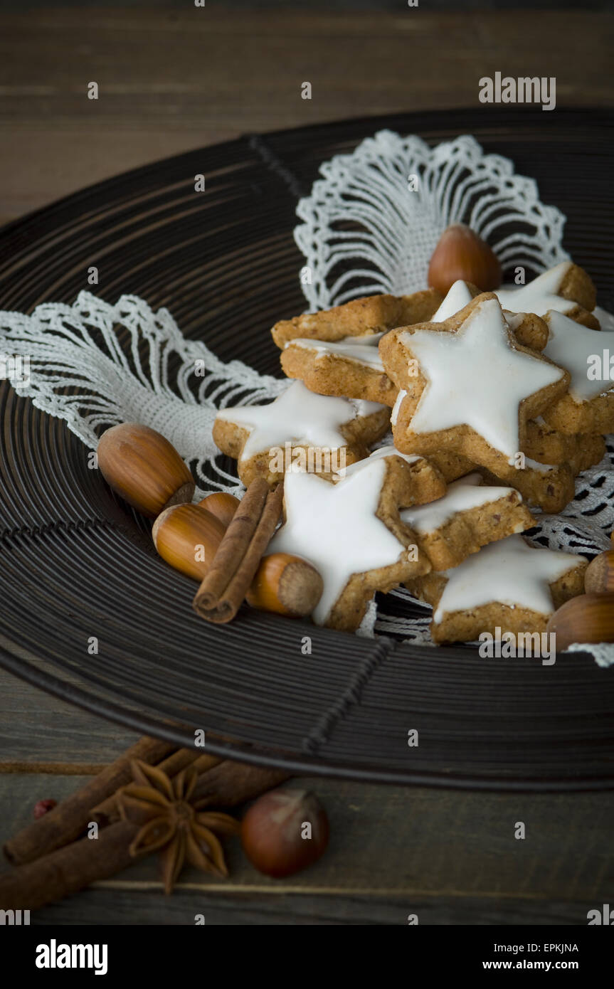 Cinnamon stars, spices and hazelnuts Stock Photo - Alamy
