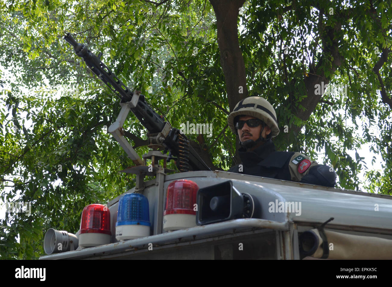 Lahore. 19th May, 2015. A Pakistani ranger stands guard outside the ...