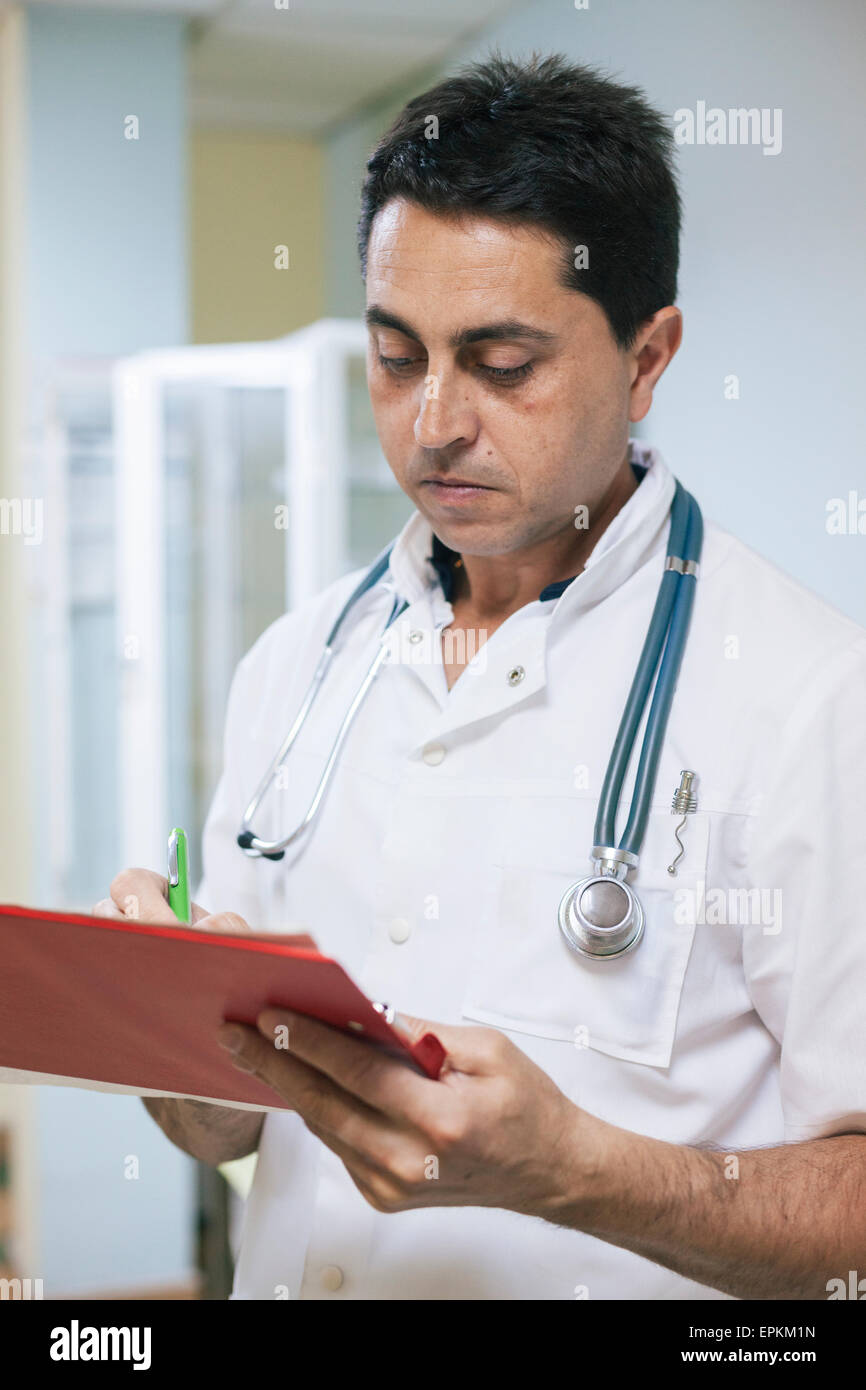Doctor taking patients record hi-res stock photography and images - Alamy