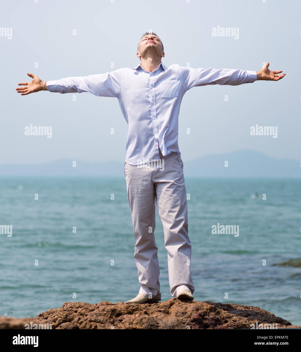 Man hands raised sky hi-res stock photography and images - Alamy