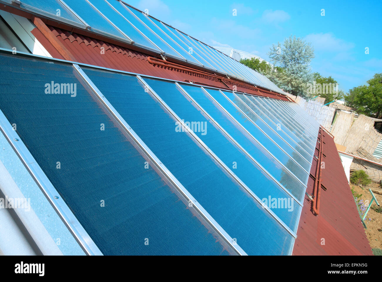 Solar system on the roof Stock Photo - Alamy
