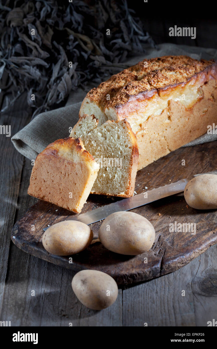 Sliced potato bread and potatoes Stock Photo - Alamy