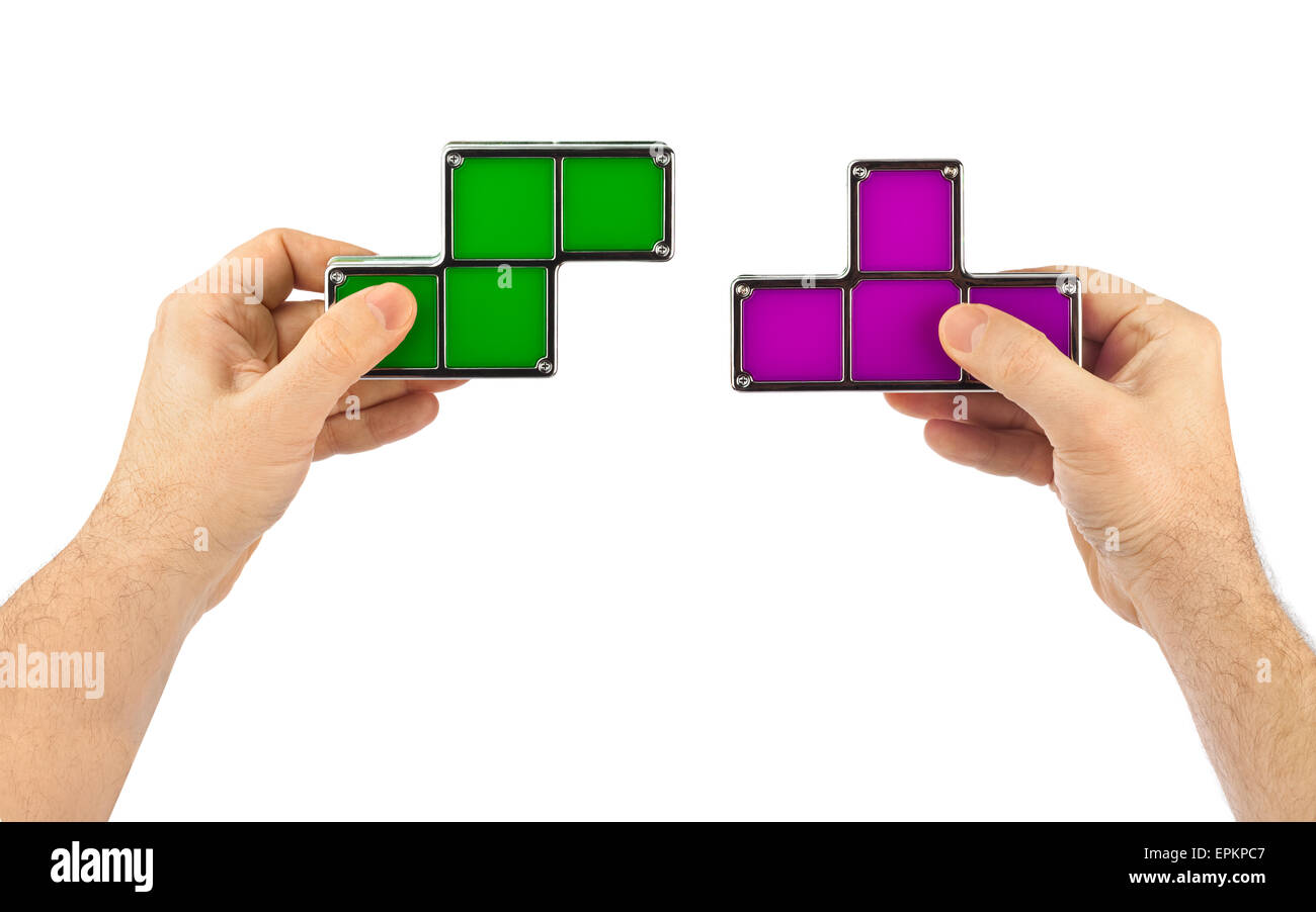 Hands with tetris toy blocks Stock Photo - Alamy