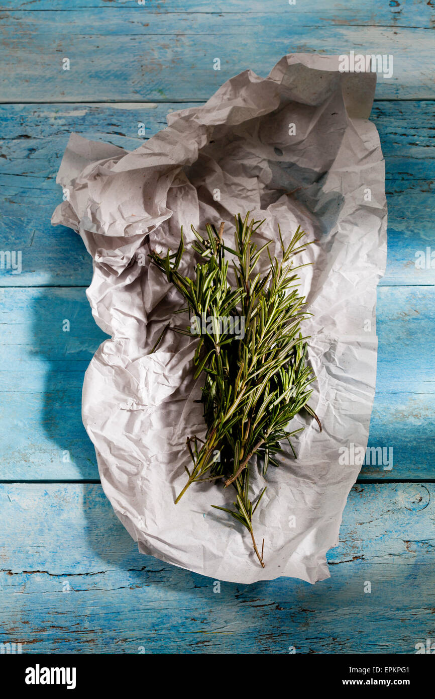 Rosemary on paper Stock Photo - Alamy