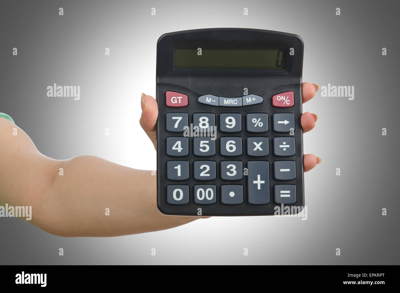 Hand holding calculator on white Stock Photo - Alamy