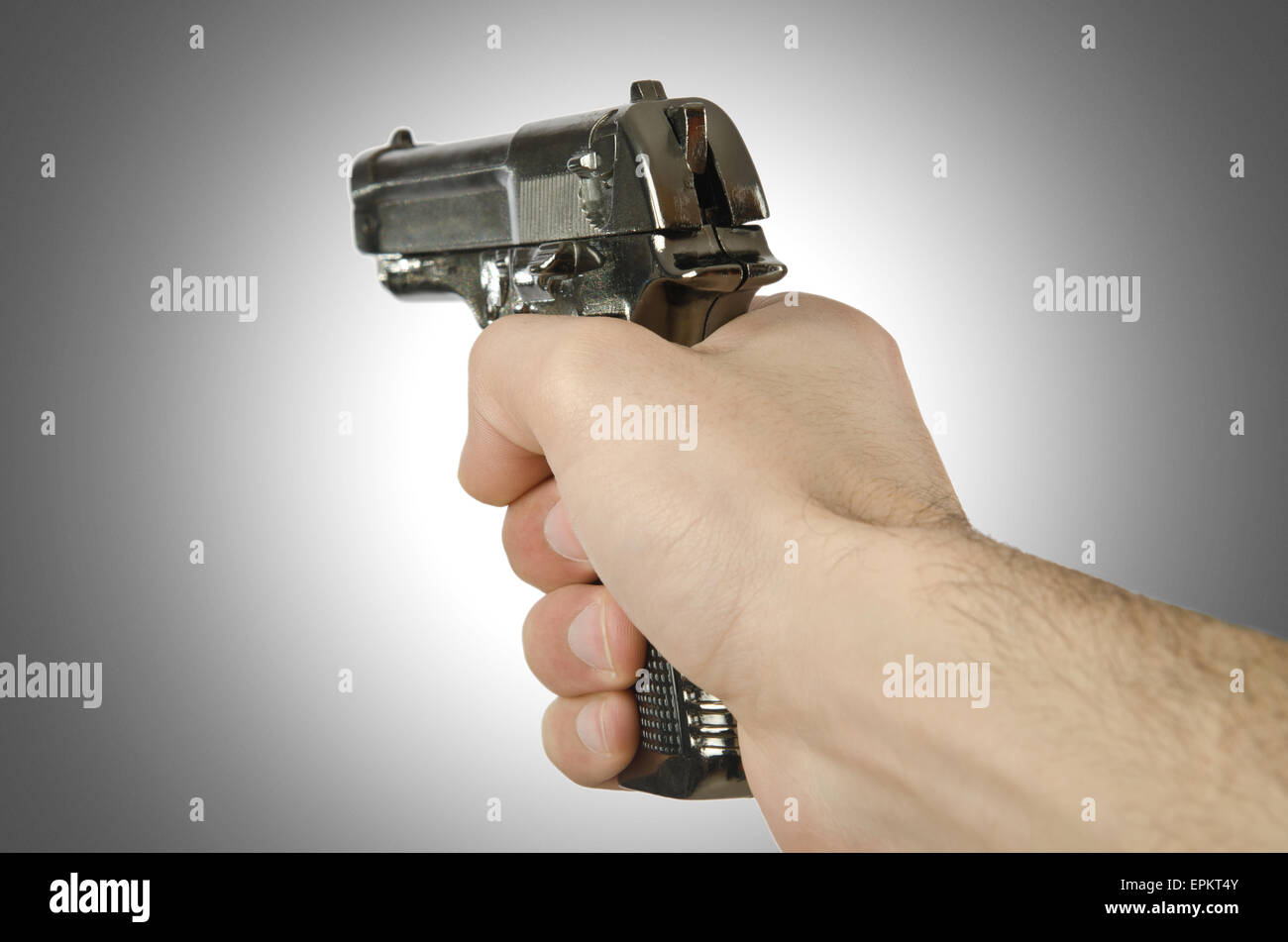 Gun in the hand on white Stock Photo - Alamy