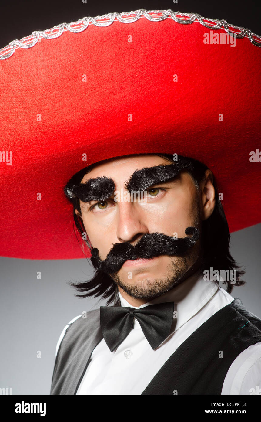 Mexican man wears sombrero isolated on white Stock Photo - Alamy