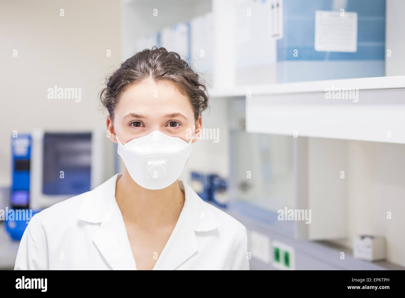 Portrait of young lab technician wearing a mask Stock Photo - Alamy