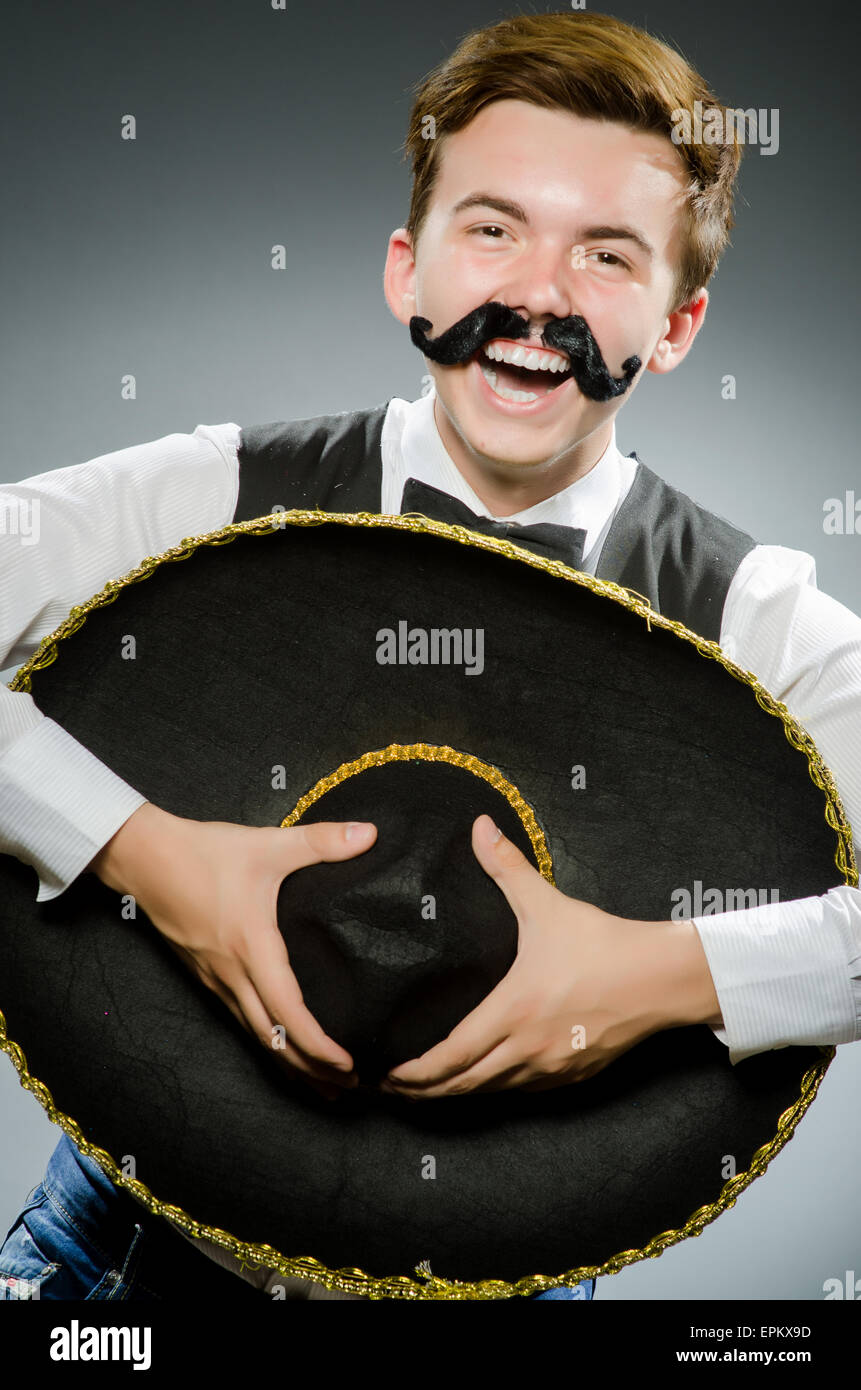 Smiling mexican with sombrero isolated on white Stock Photo - Alamy