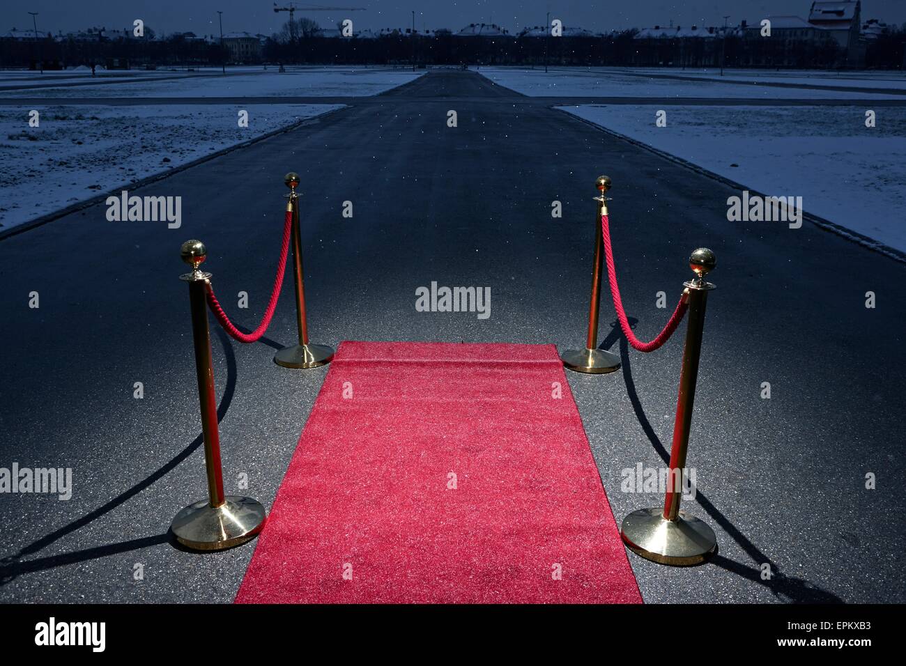 Red carpet on street, city in the background Stock Photo - Alamy