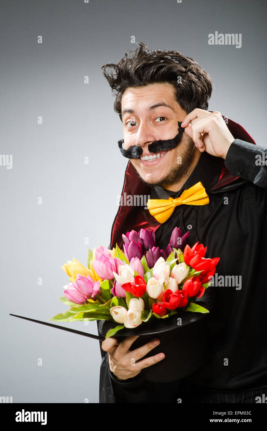 Funny magician man with wand and hat Stock Photo - Alamy