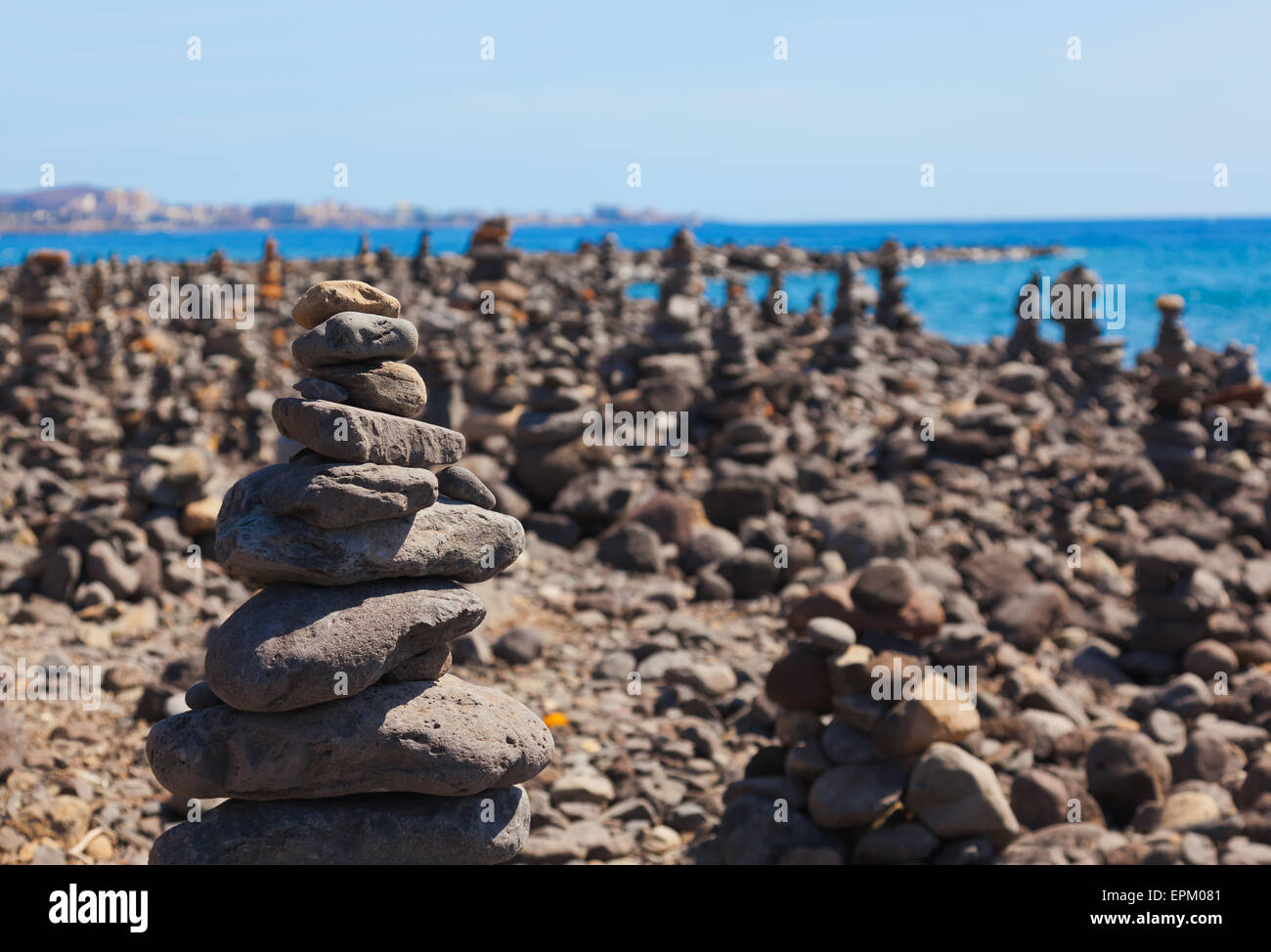 Stack of stones on beach Stock Photo - Alamy