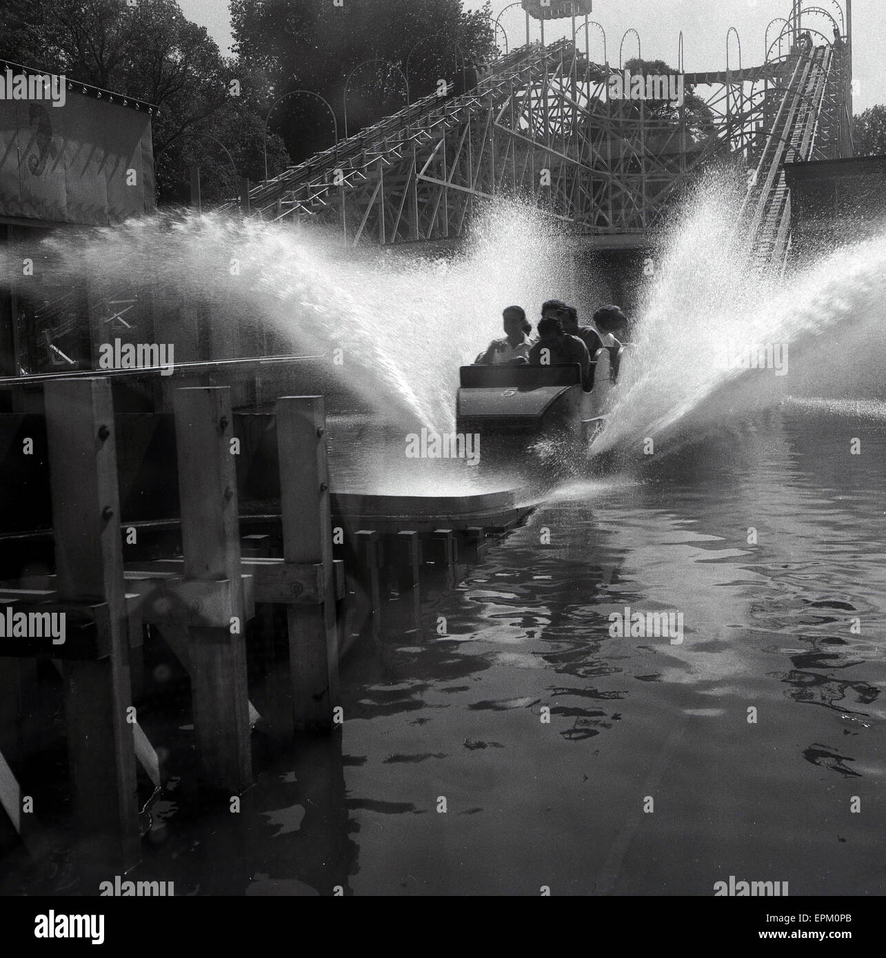 1950s, historical, early water coaster ride, picture shows a family ...