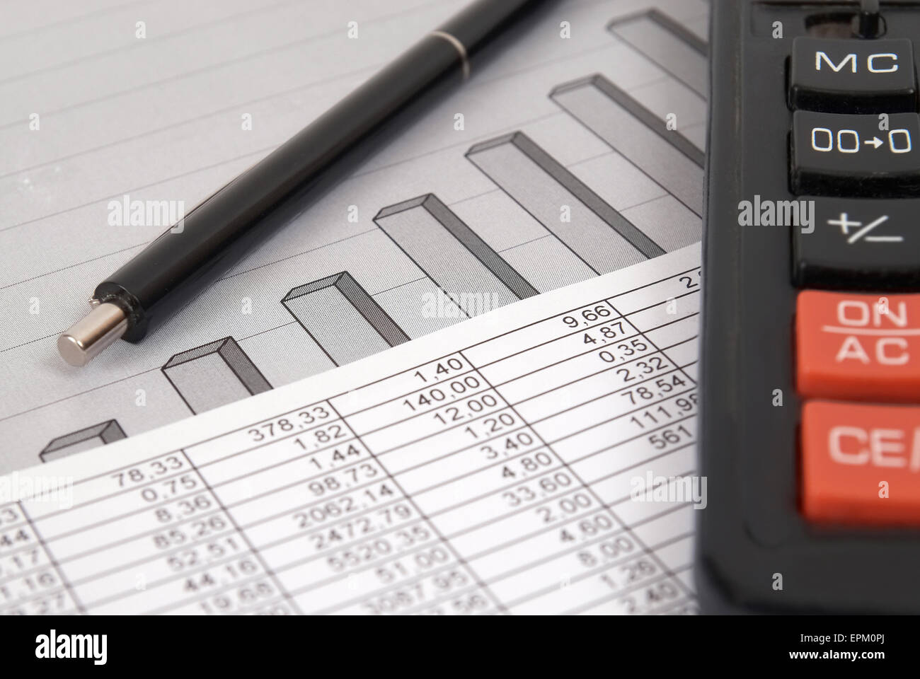 Pen and calculator Stock Photo - Alamy