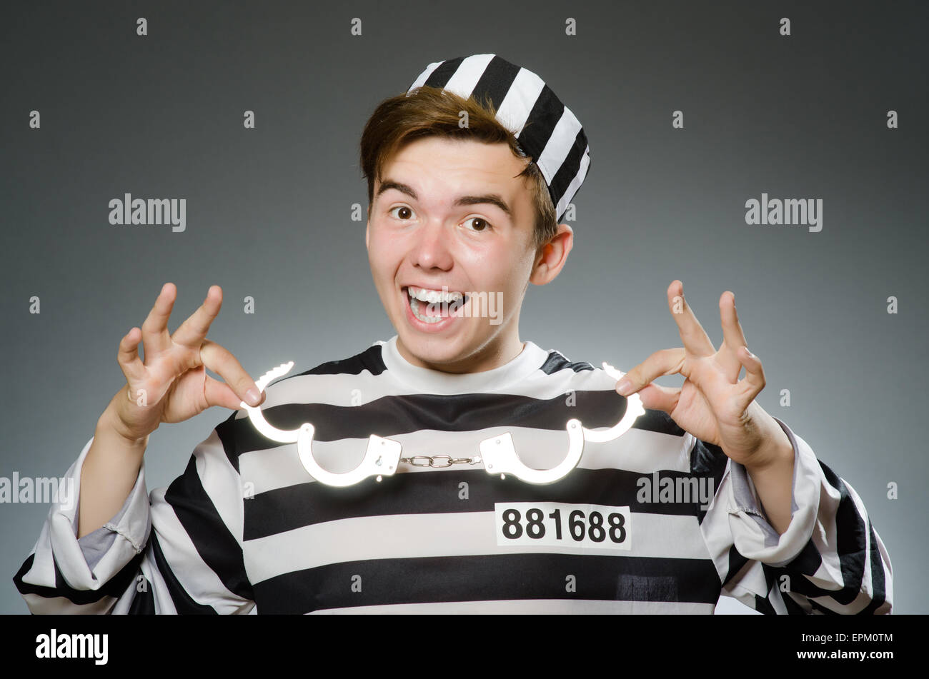 Prison inmate in funny concept Stock Photo - Alamy