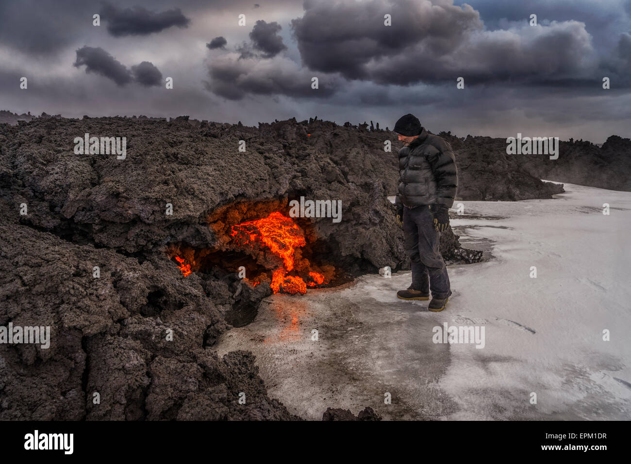 Volcano eruption man hi-res stock photography and images - Alamy