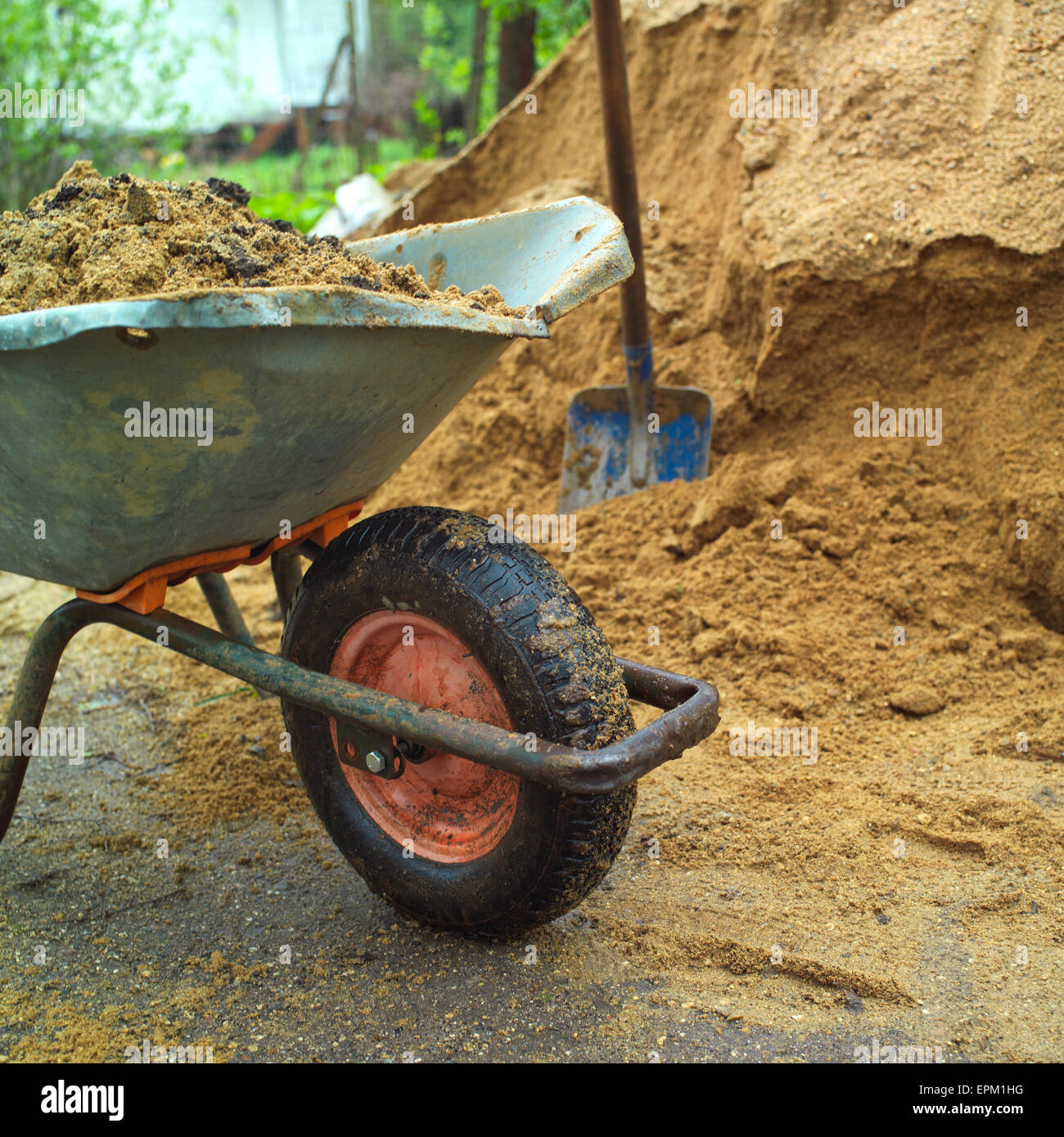Trolley full of sand Stock Photo - Alamy
