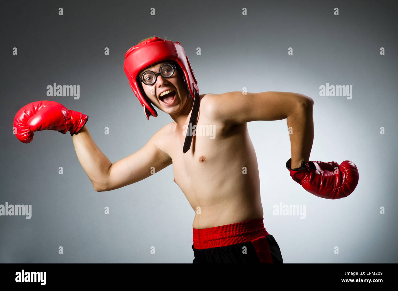 Funny boxer against dark background Stock Photo - Alamy