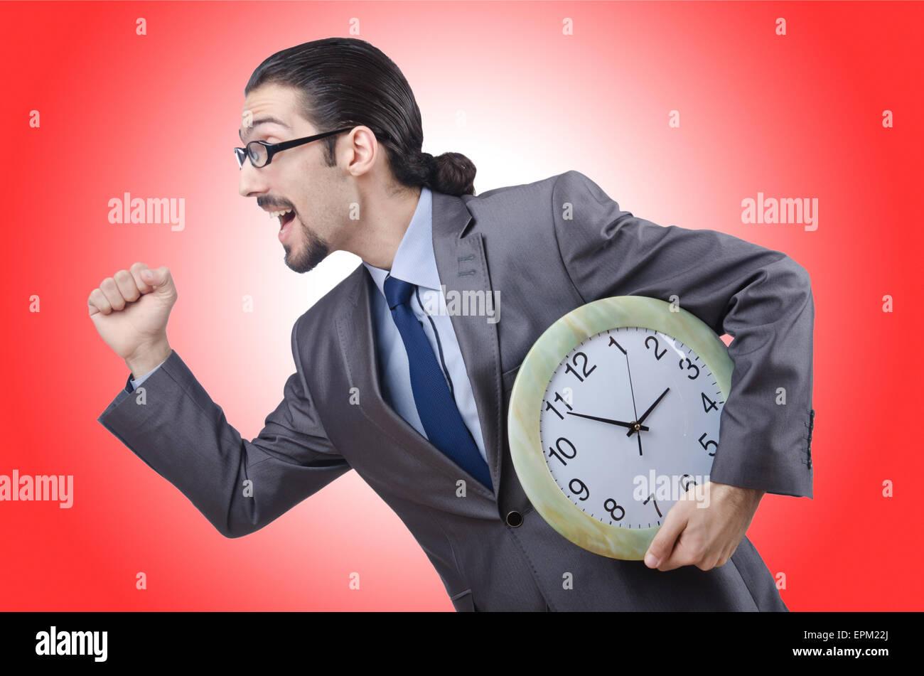 Man with clock isolated on white Stock Photo - Alamy
