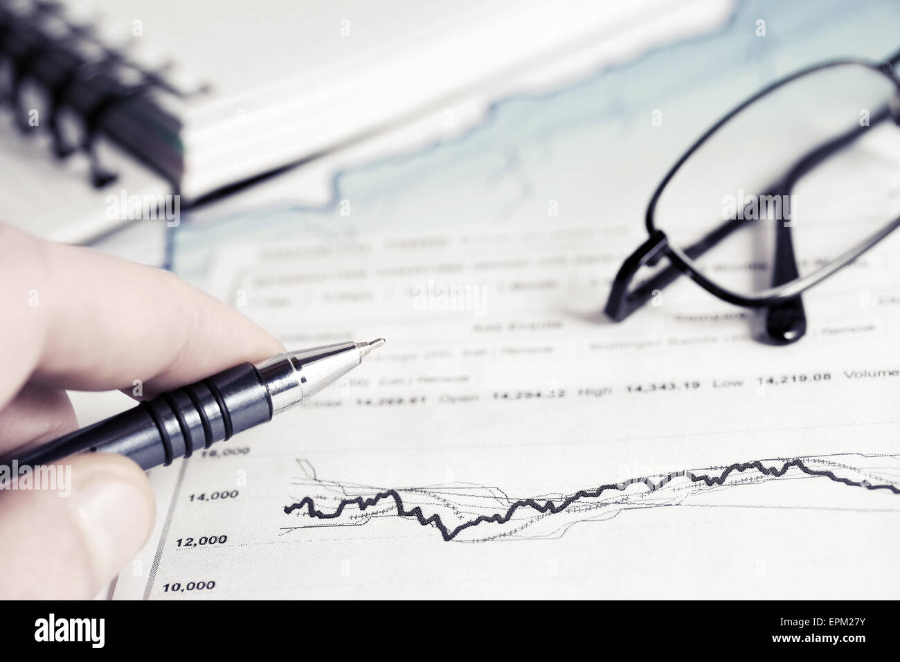 Financial graphs and charts analysis Stock Photo - Alamy