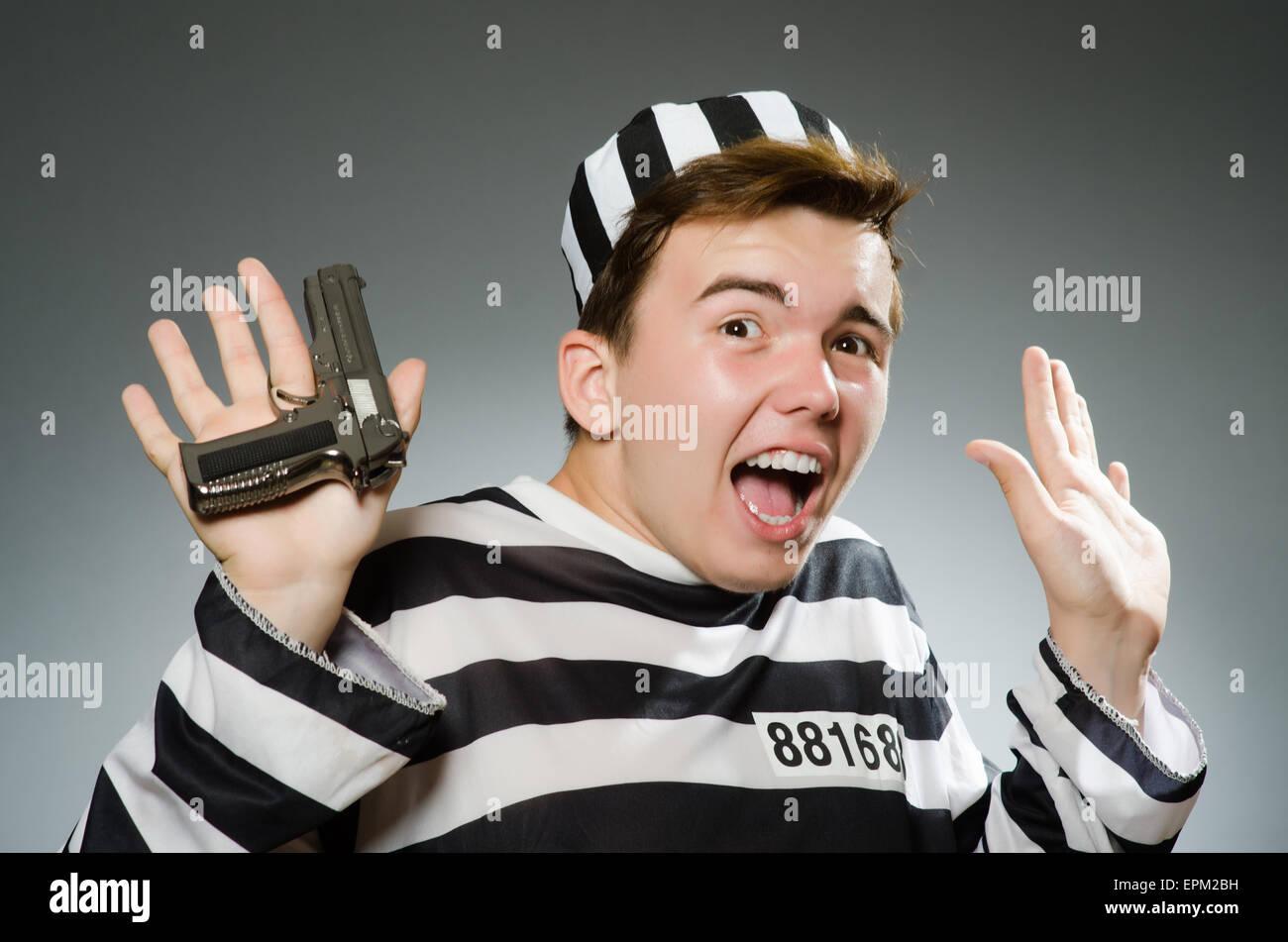 Prison inmate in funny concept Stock Photo - Alamy