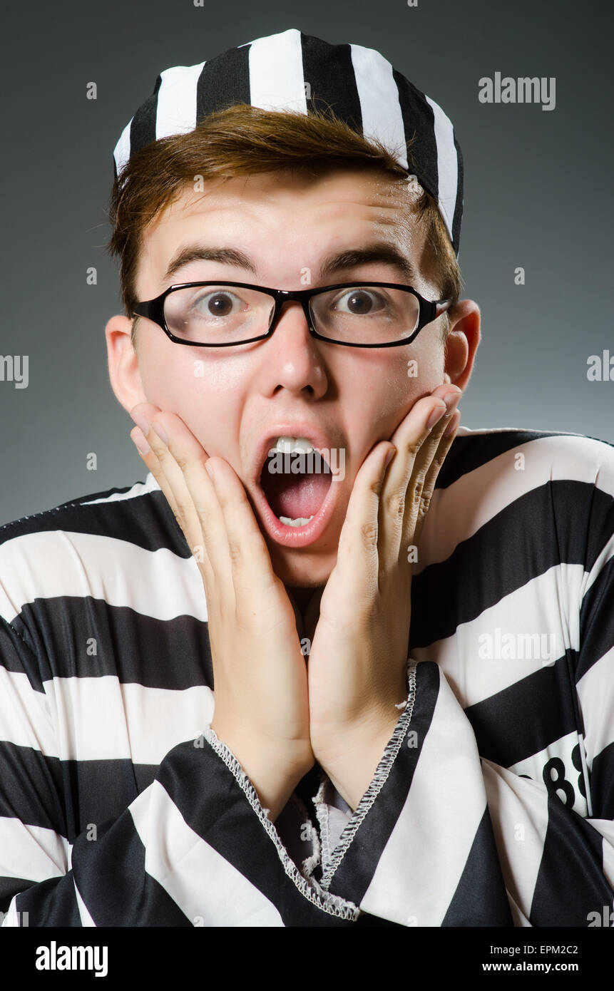 Prison inmate in funny concept Stock Photo - Alamy