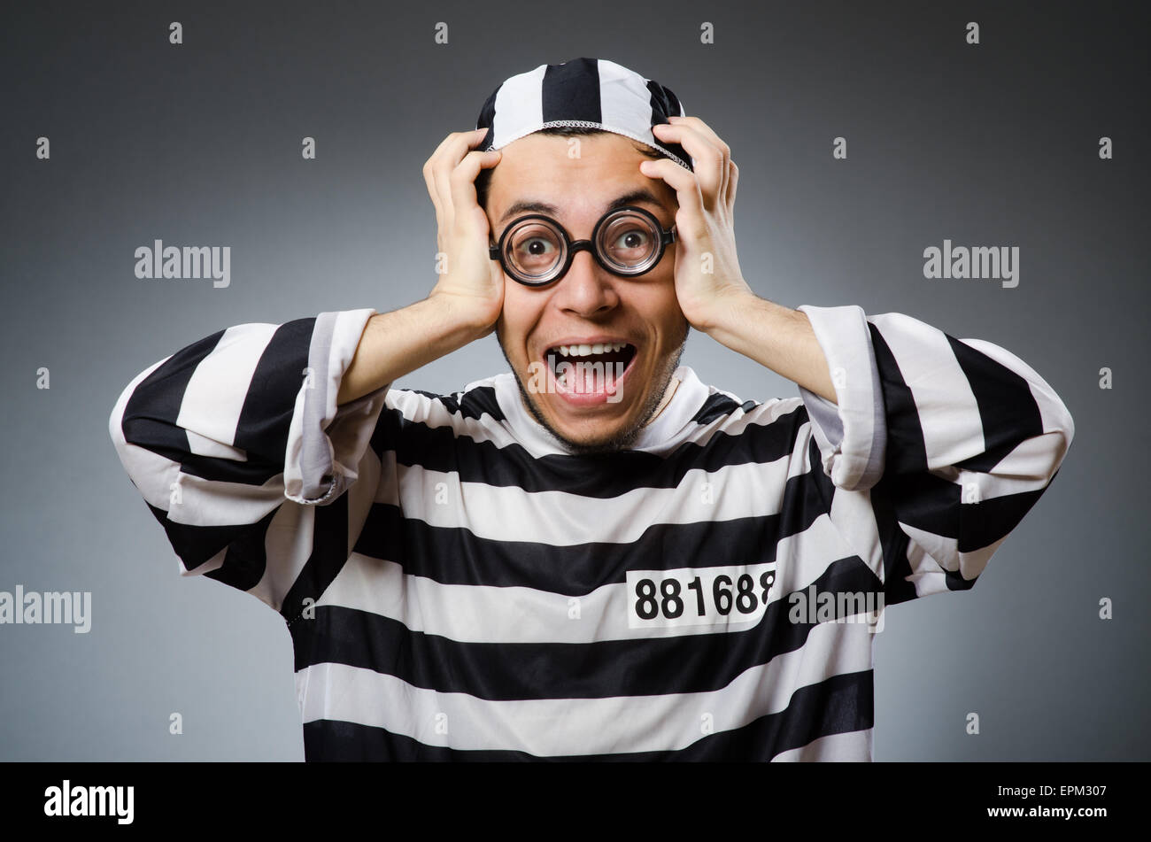 Prison inmate in funny concept Stock Photo - Alamy