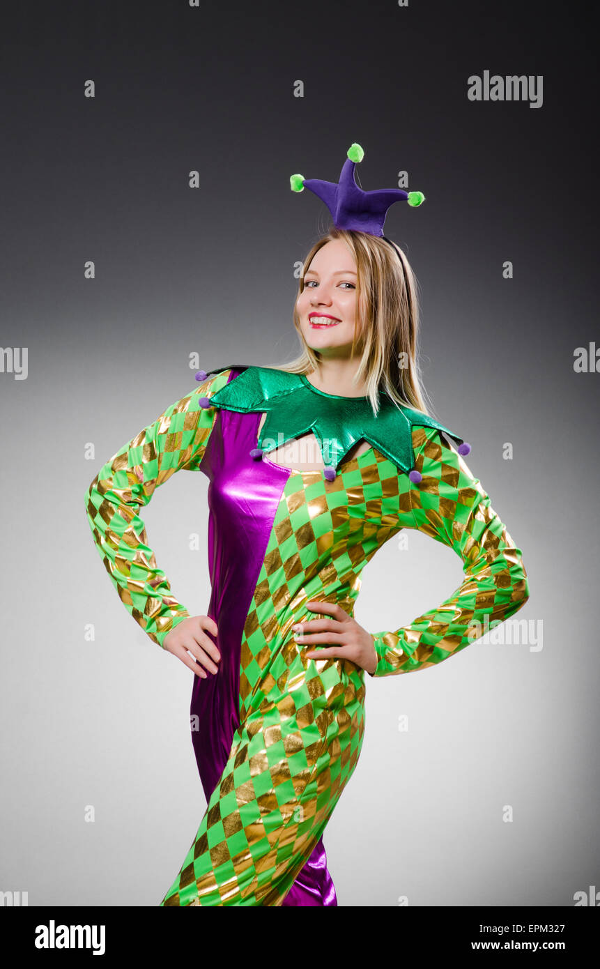 Funny clown in colourful costume Stock Photo - Alamy