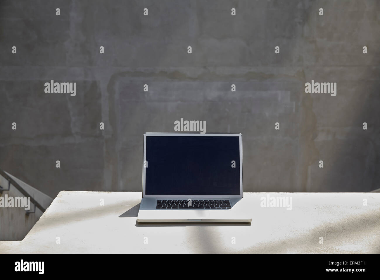 Laptop on in a modern building Stock Photo - Alamy