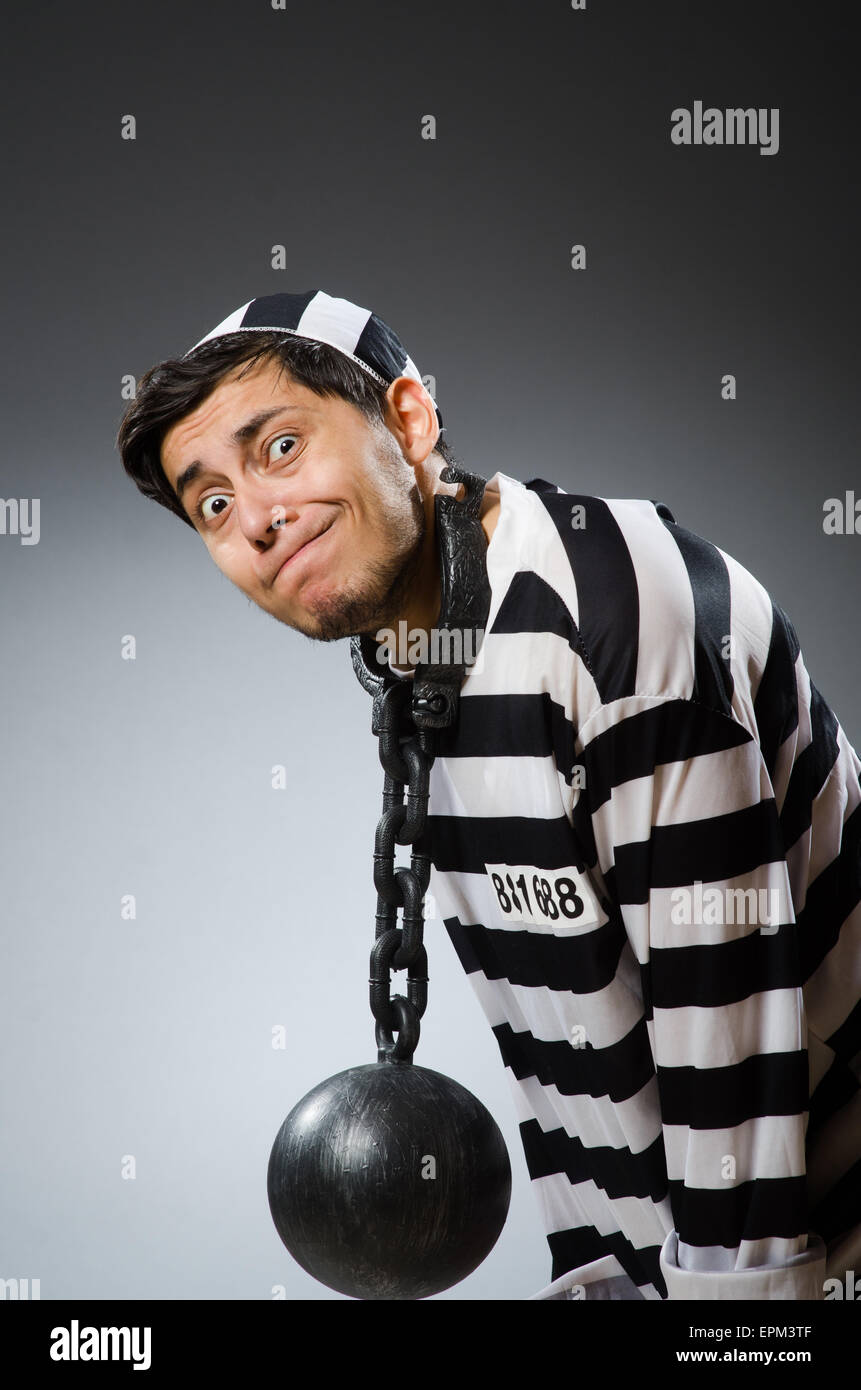 Prison inmate in funny concept Stock Photo - Alamy
