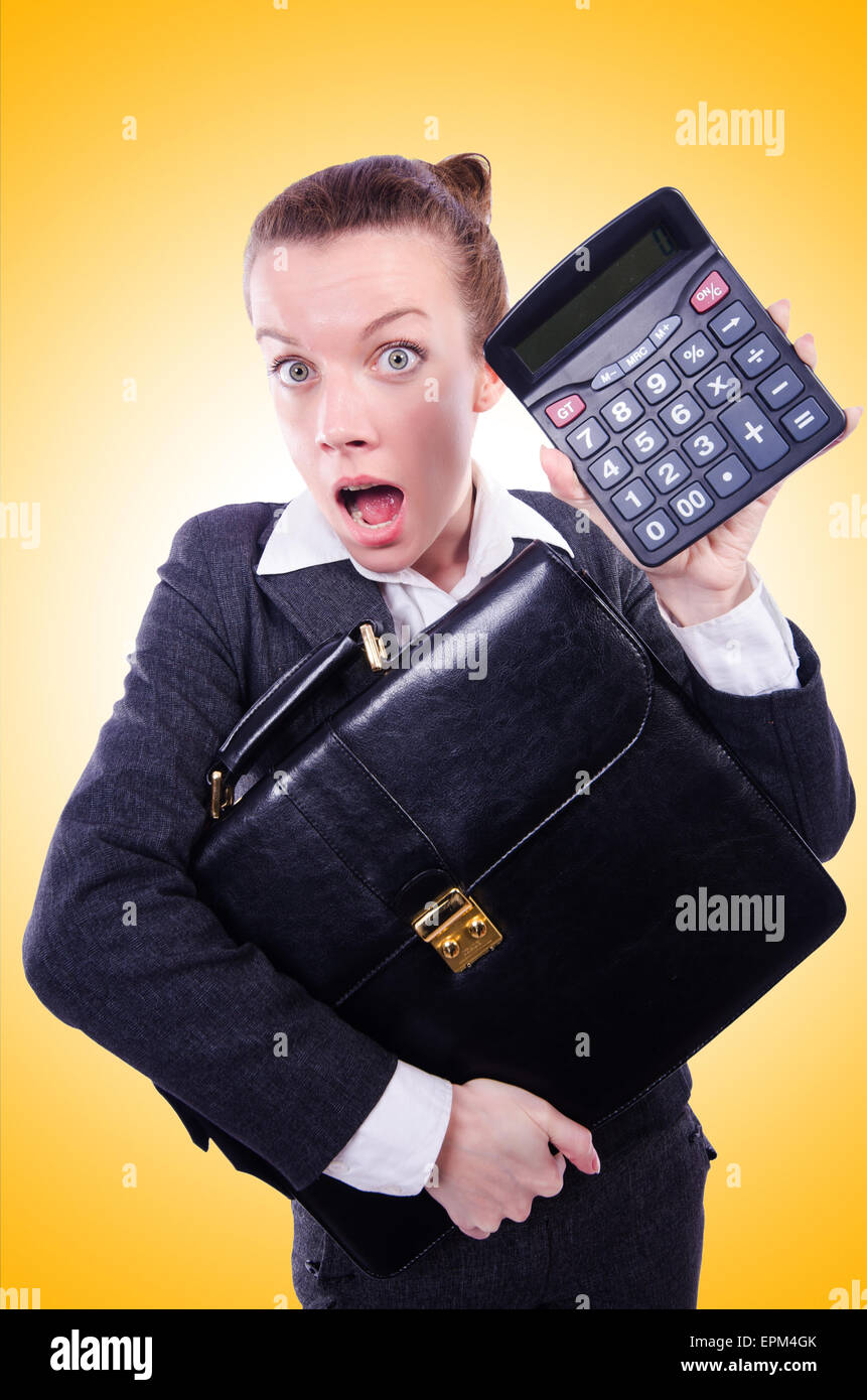 Nerd female accountant with calculator Stock Photo - Alamy