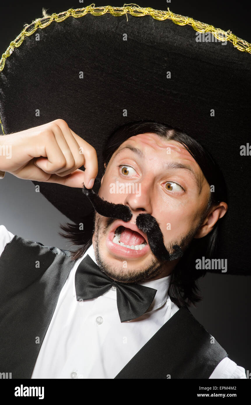 Mexican man wears sombrero isolated on white Stock Photo - Alamy
