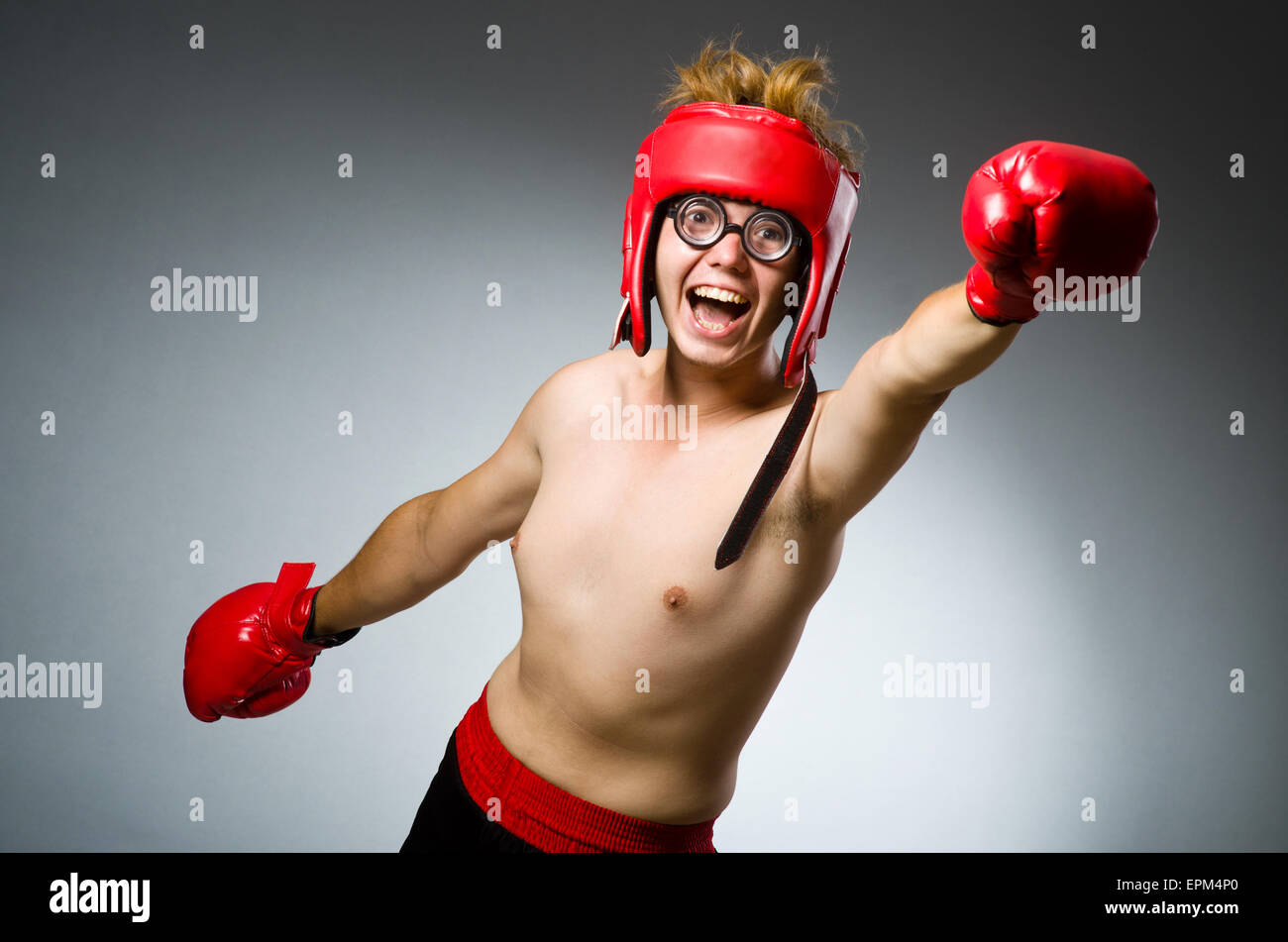 Funny boxer against dark background Stock Photo - Alamy