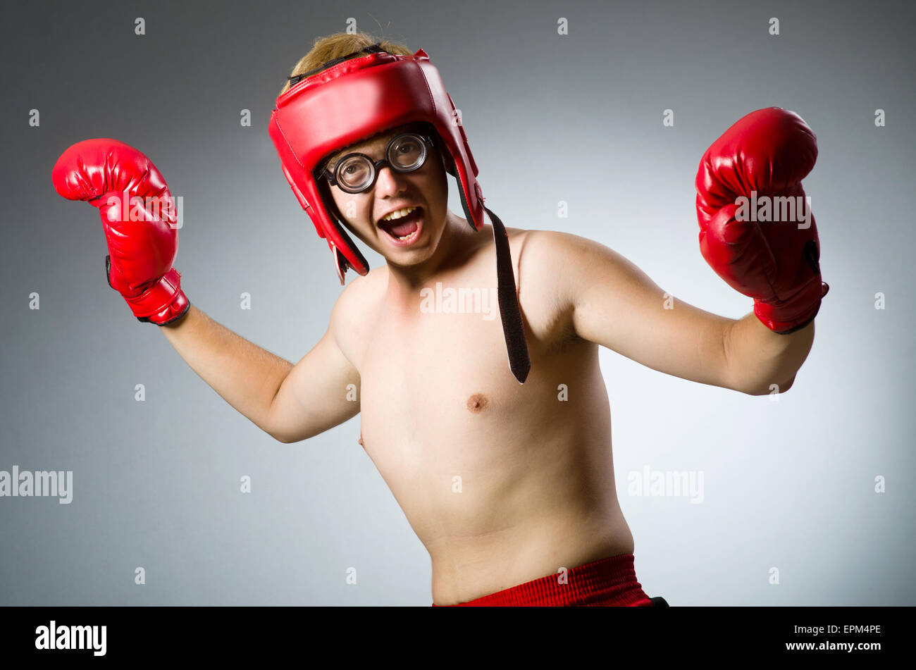 Funny boxer against dark background Stock Photo - Alamy