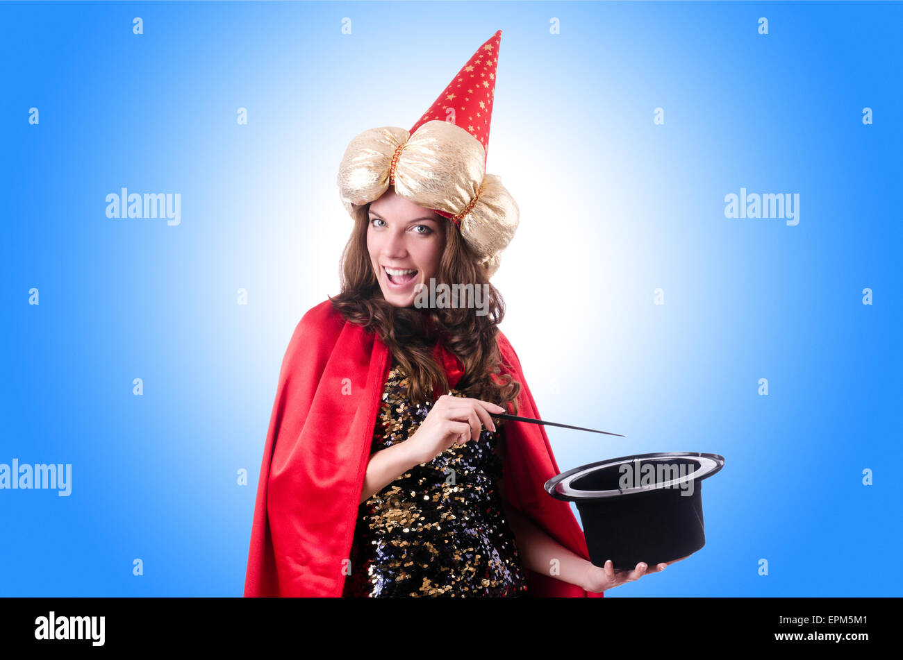 Female magician isolated on white Stock Photo - Alamy
