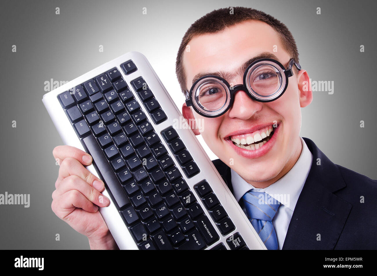 Computer geek nerd in funny concept Stock Photo - Alamy