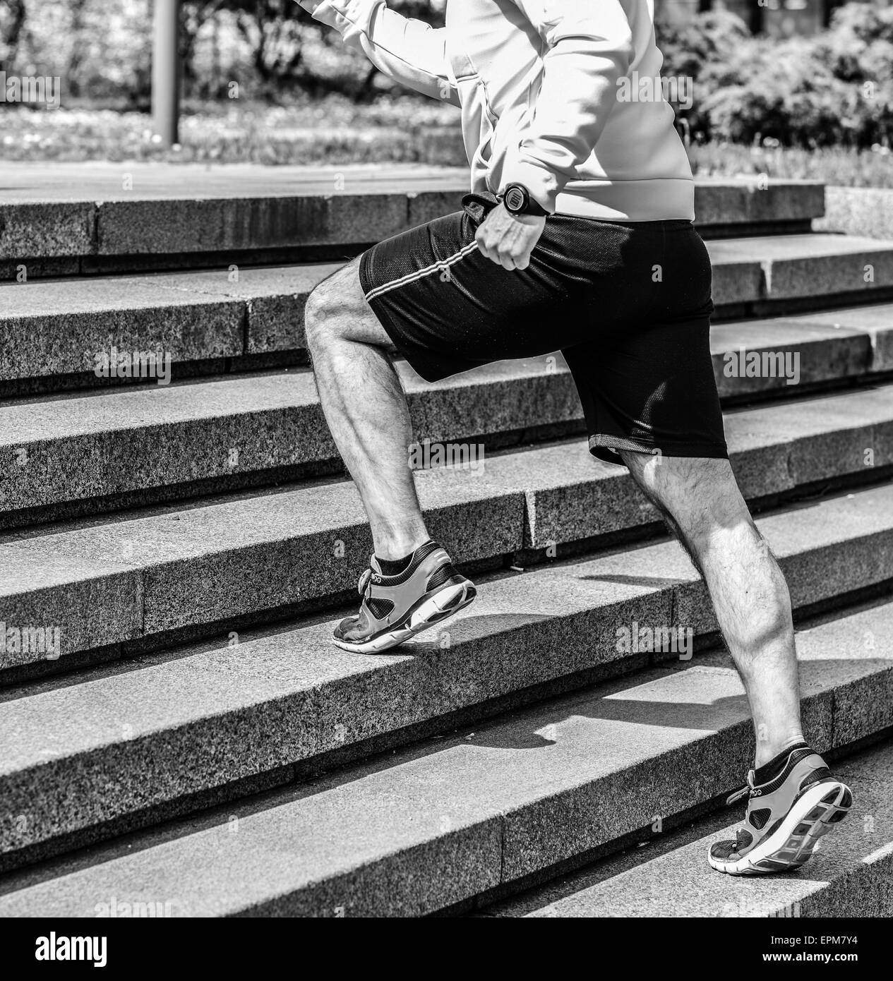 Black man running up stairs hi-res stock photography and images - Alamy