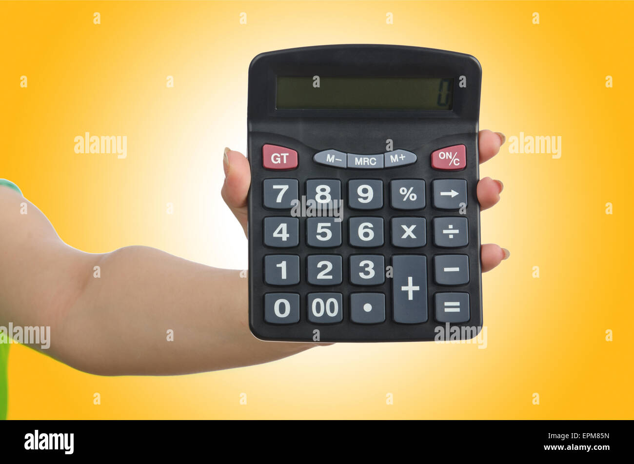 Hand holding calculator on white Stock Photo - Alamy