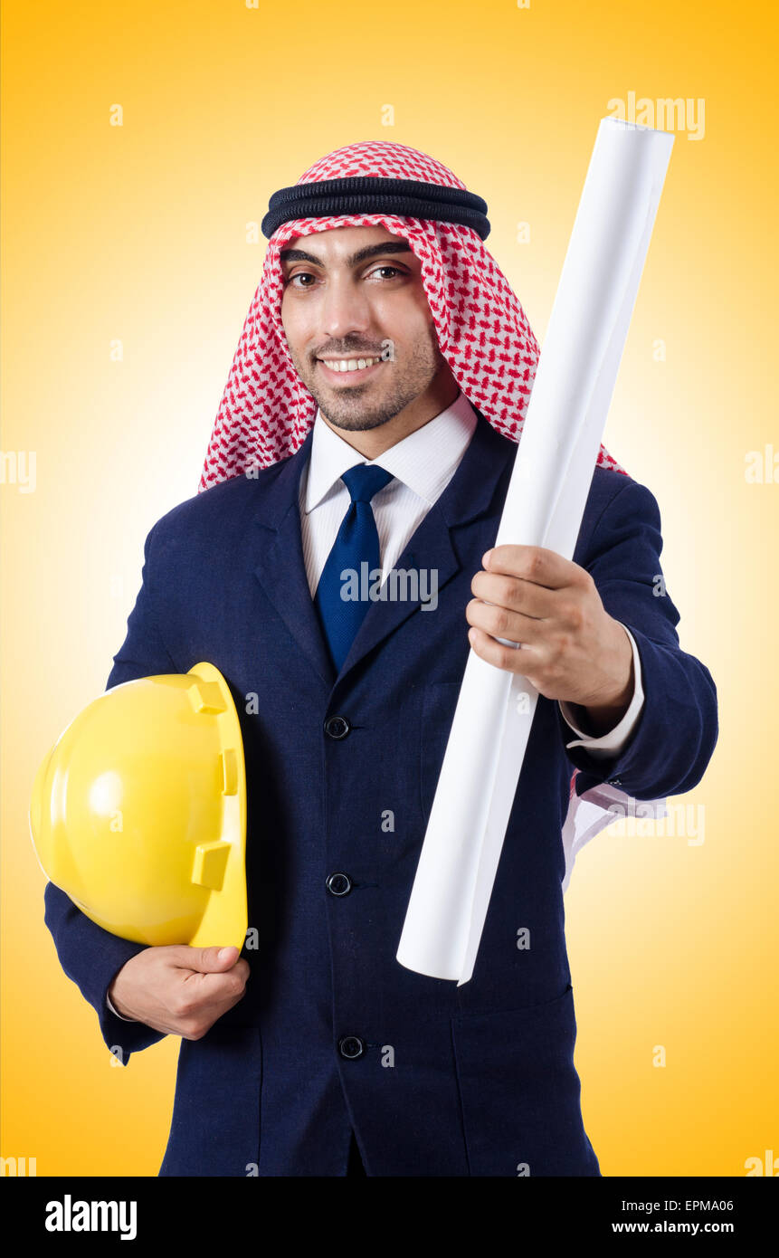 Arab engineer with drawings on white Stock Photo - Alamy
