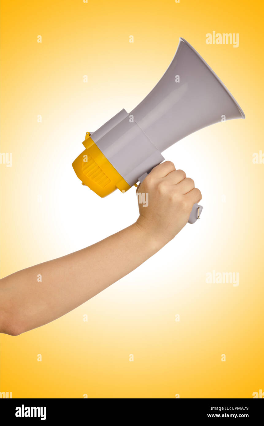 Hand holding loudspeaker on white Stock Photo - Alamy