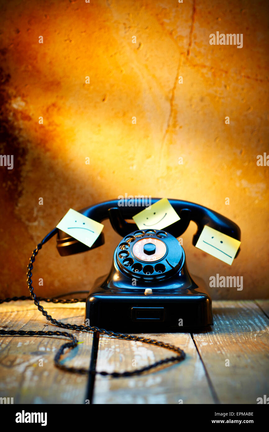 Black old bakelite telephone with adhesive notes Stock Photo - Alamy
