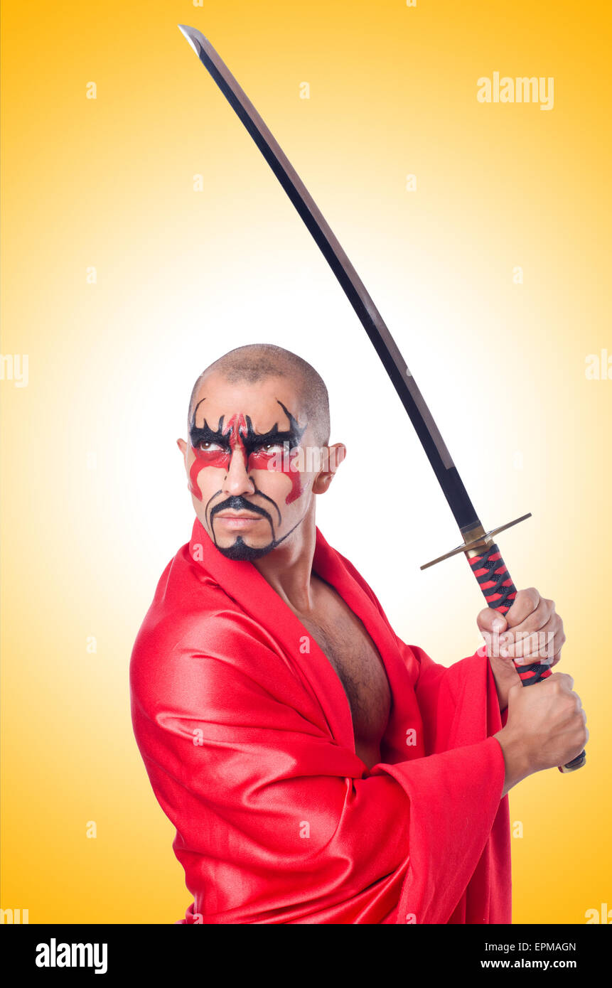 Man with sword isolated on white Stock Photo - Alamy