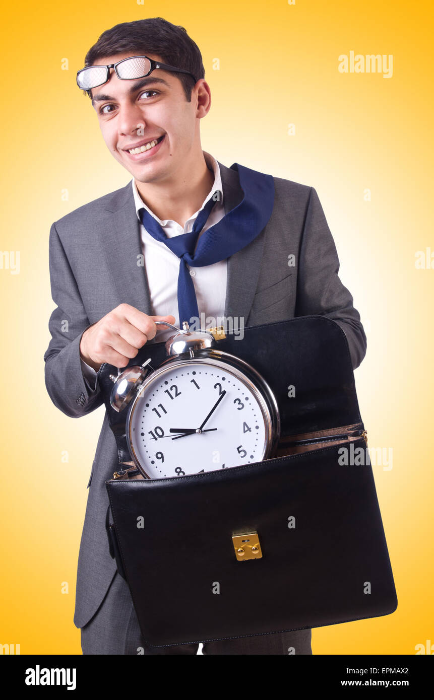 Businessman with clock isolated on white Stock Photo - Alamy