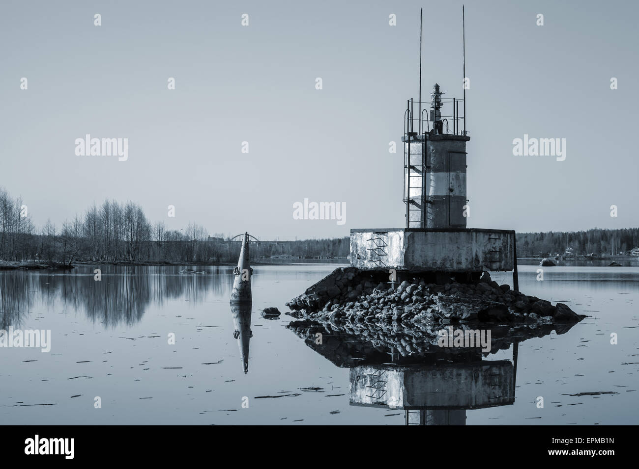 Beacon on the rocks and buoy of the Saimaa Canal, a transportation ...