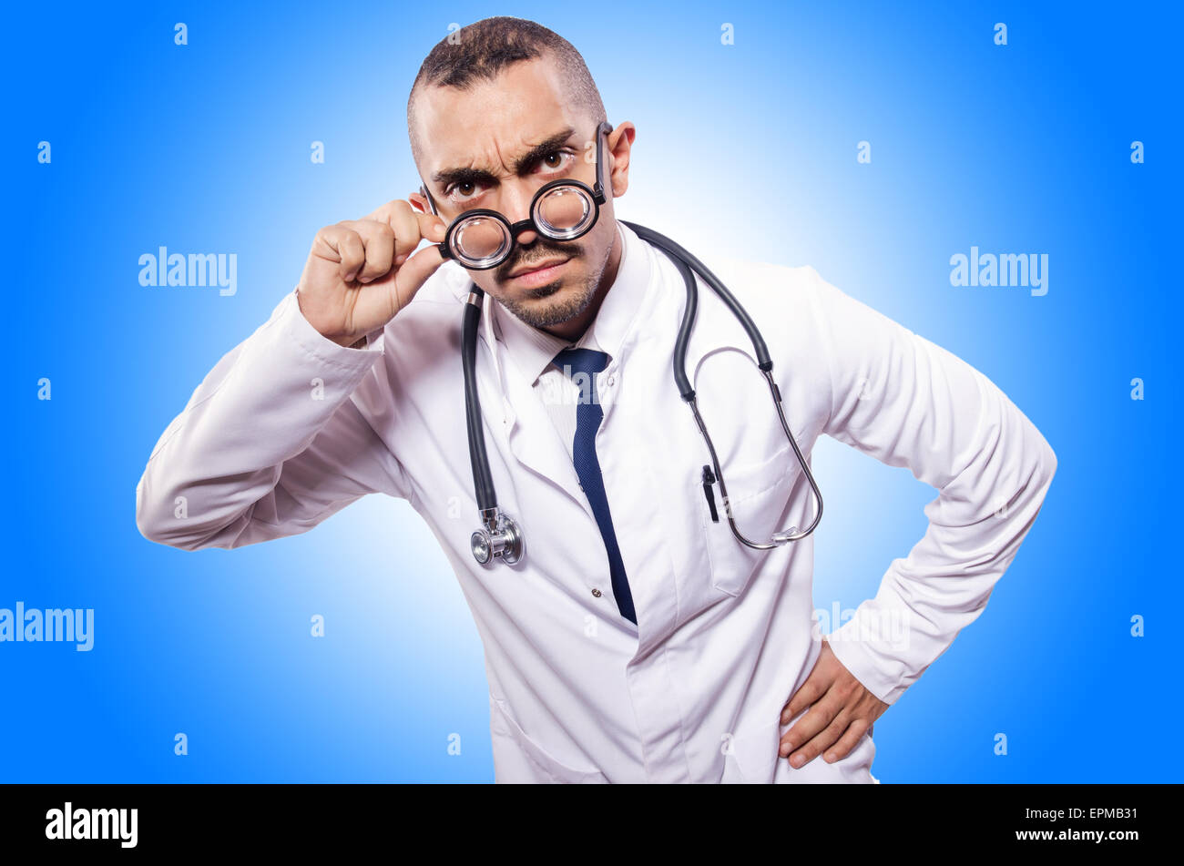 Funny doctor isolated on the white Stock Photo - Alamy